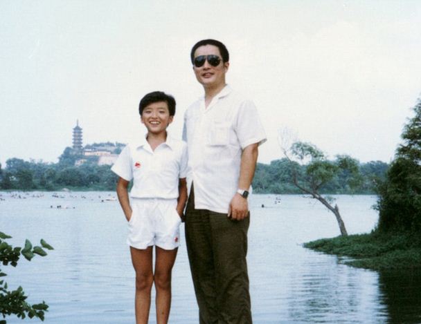 Beautiful daddy/ daughter moment captured in the same spot for...