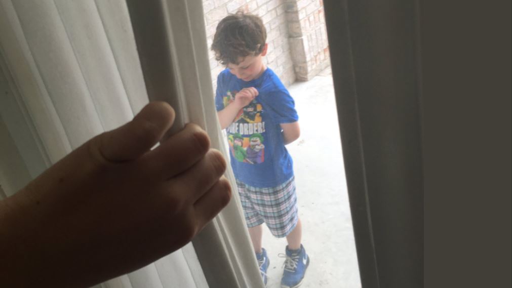 The reason this little boy is knocking on his neighbour's door...